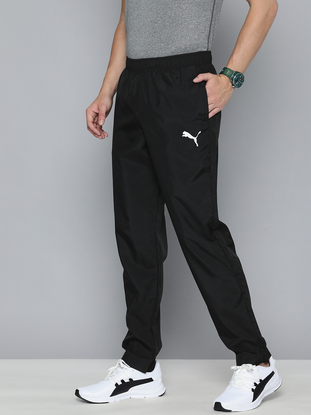 Buy PUMA Men Black Brand Logo Printed Regular Fit Woven Track Pants ...