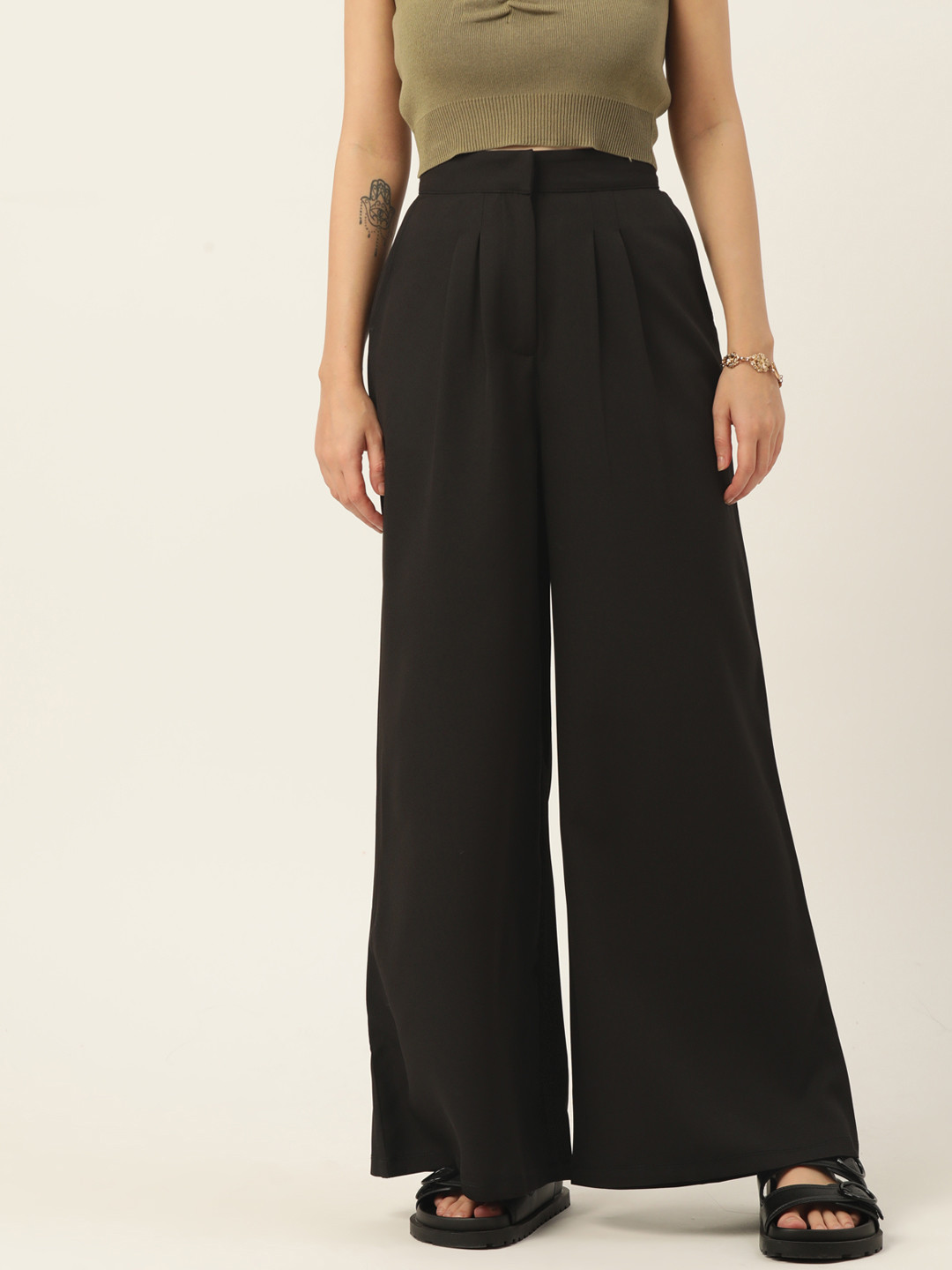 Buy DressBerry Women Black Solid Pleated Flared Trousers - Trousers for ...