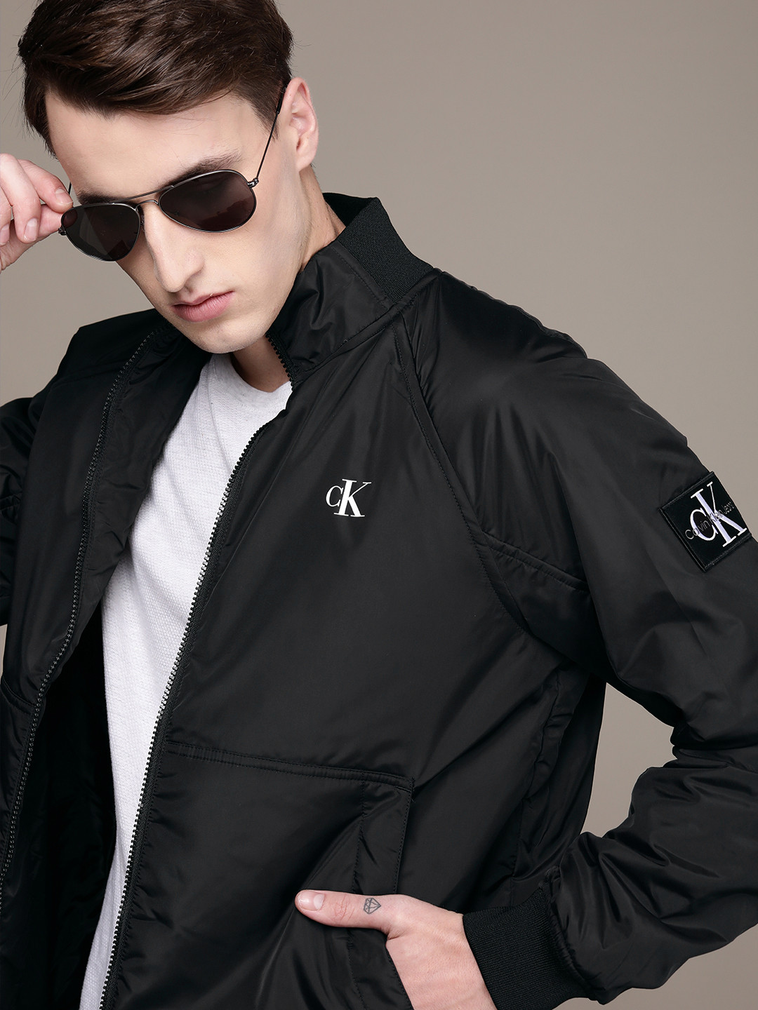 Buy Calvin Klein Jeans Men Black Solid Mock Collar Padded HARRINGTON ...