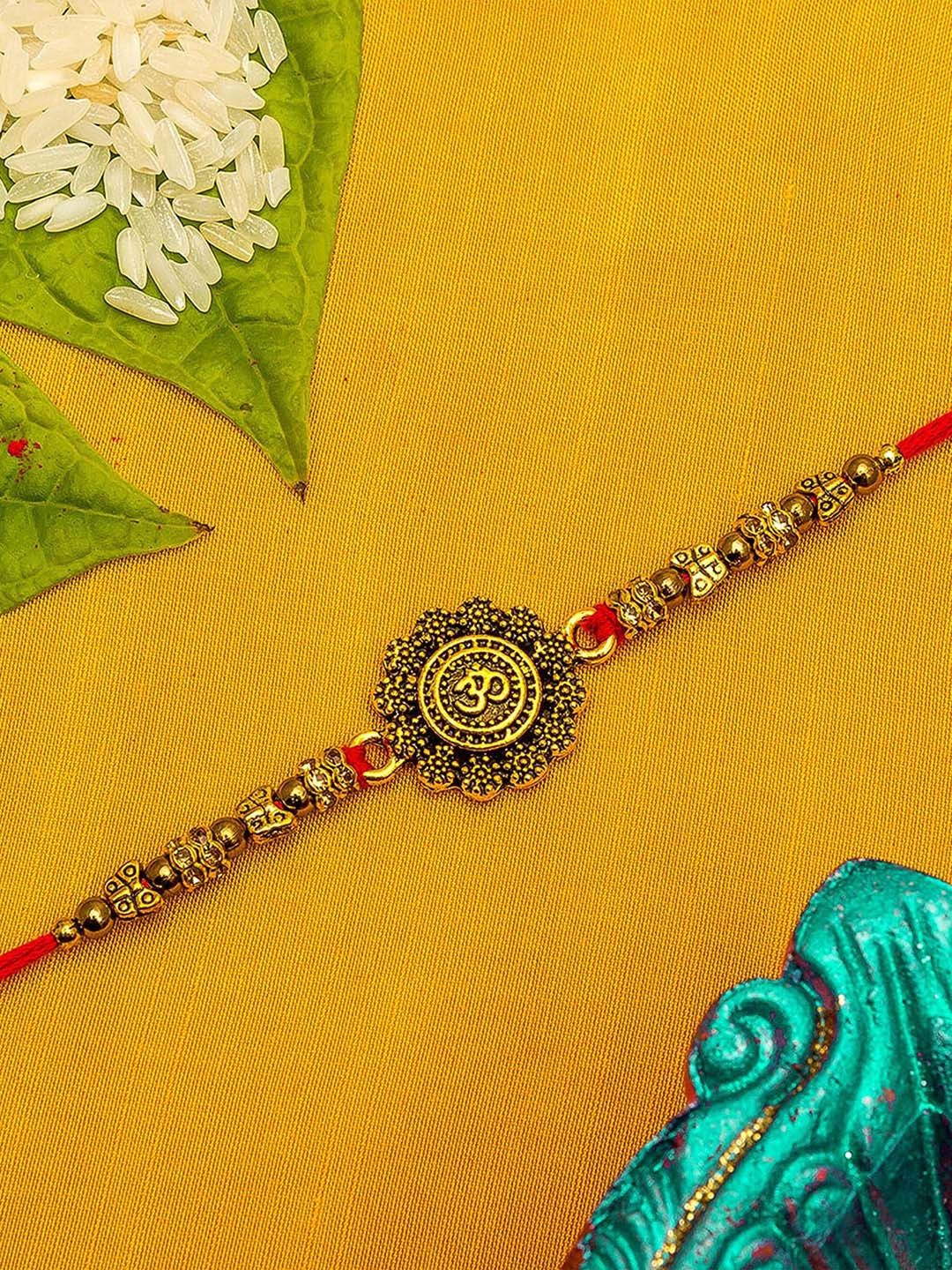 Buy Aadita Men Gold Toned Stone String Handmade Rakhi - Rakhi for Men ...