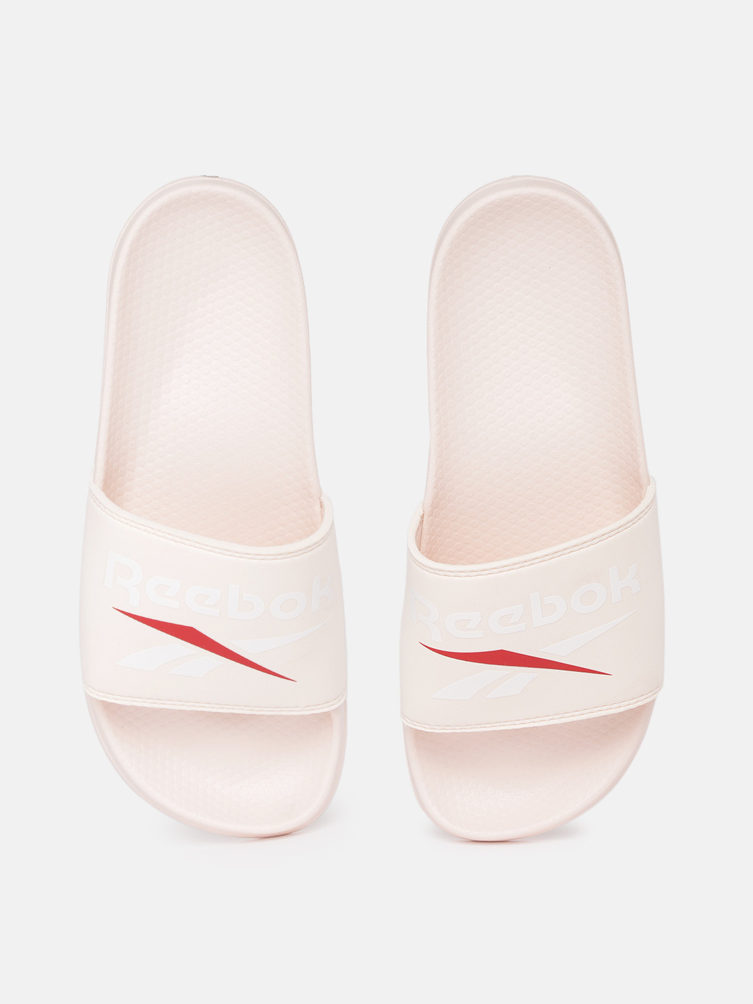 Buy Reebok Women Pink & White Brand Logo Printed Sliders - Flip Flops ...
