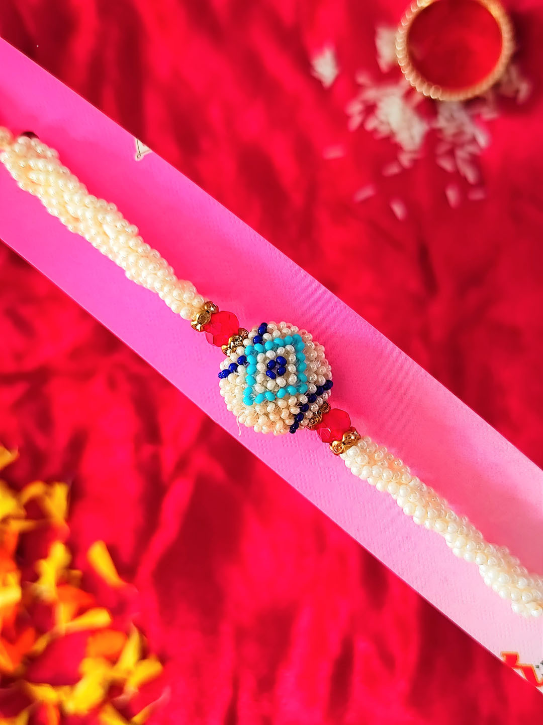 Buy CRAYTON Men Red Diamond Studded Pearl Beaded Tie Up Rakhi - Rakhi ...