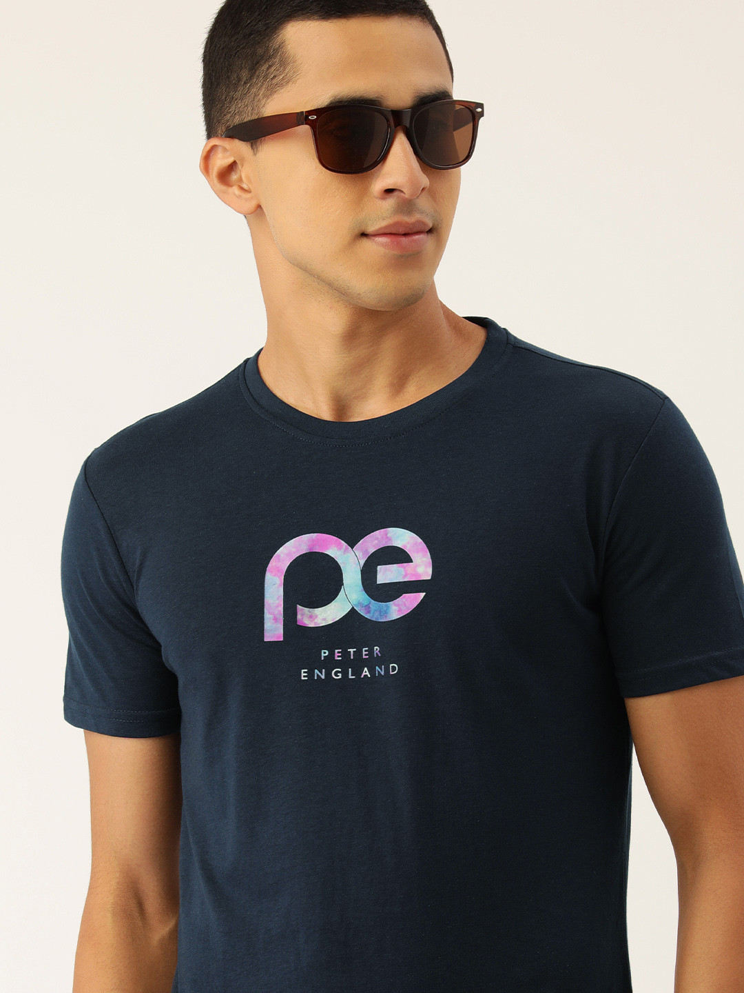 Buy Peter England Casuals Men Navy Blue Brand Logo Printed T Shirt ...