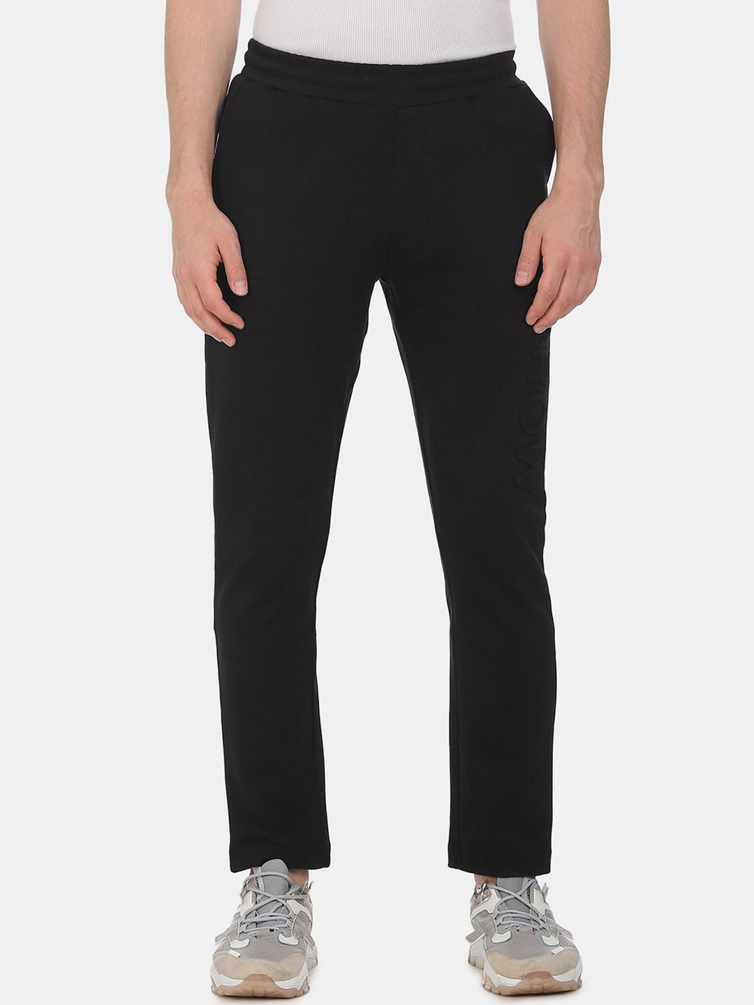 Buy Arrow Men Black Solid Straight Fit Track Pants - Track Pants for ...