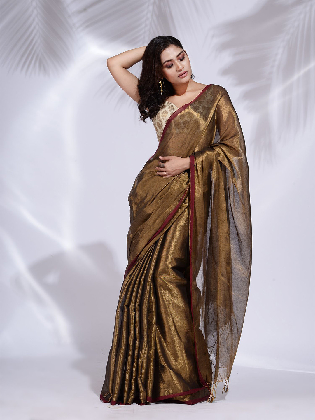 Buy Charukriti Brown Solid Soft Tissue Saree - Sarees for Women ...