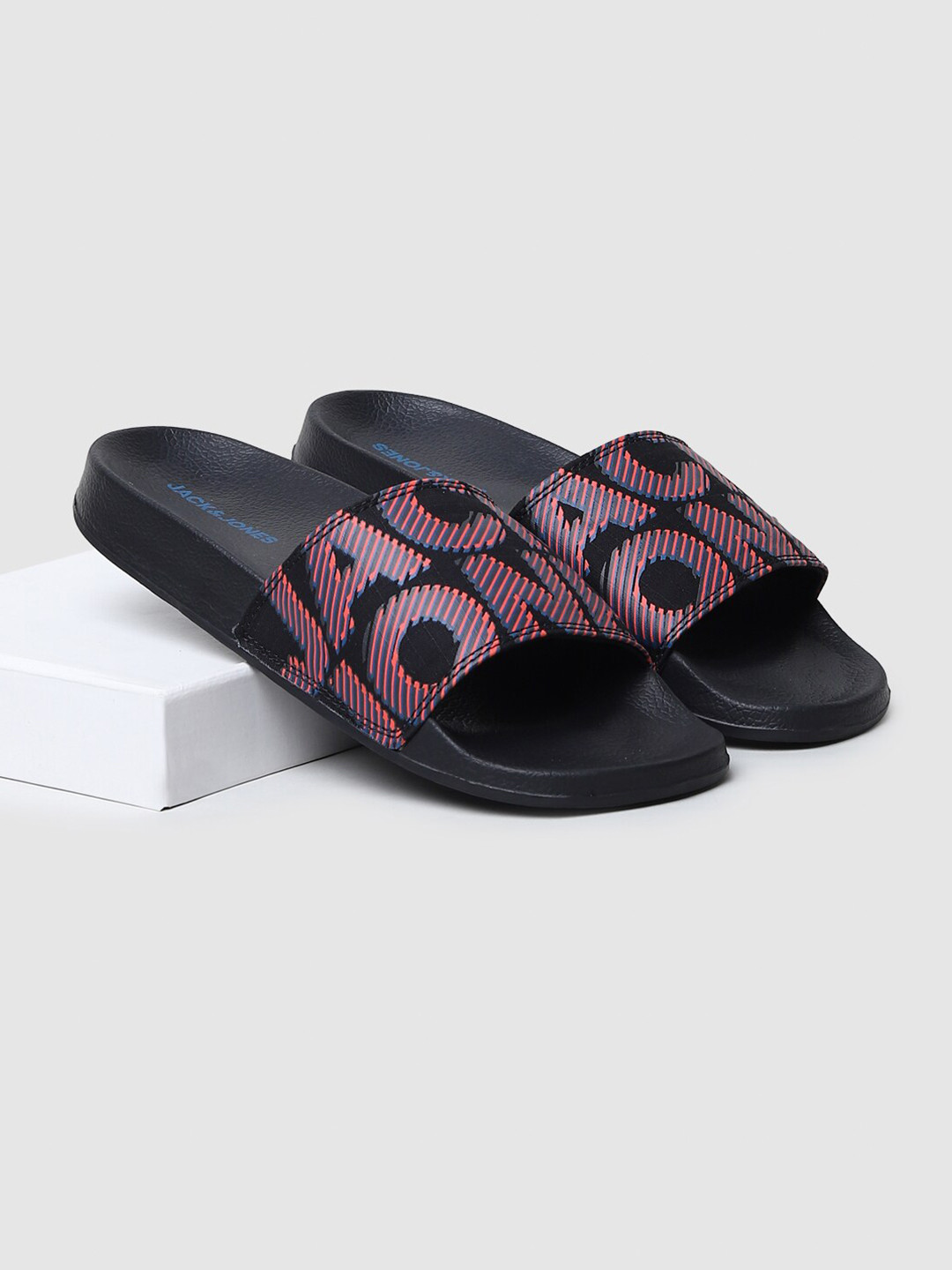 Buy Jack & Jones Men Black & Pink Printed Sliders - Flip Flops for Men ...