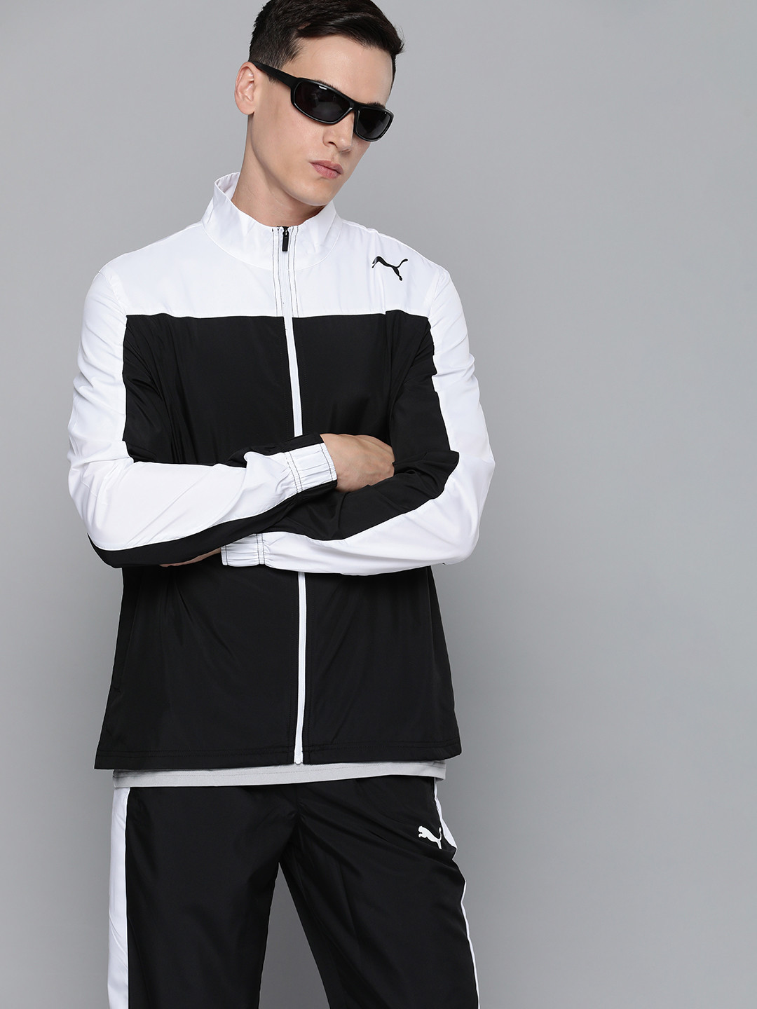Buy Puma Men Colourblocked TRAIN FAVOURITE DryCELL Woven Track Suit ...