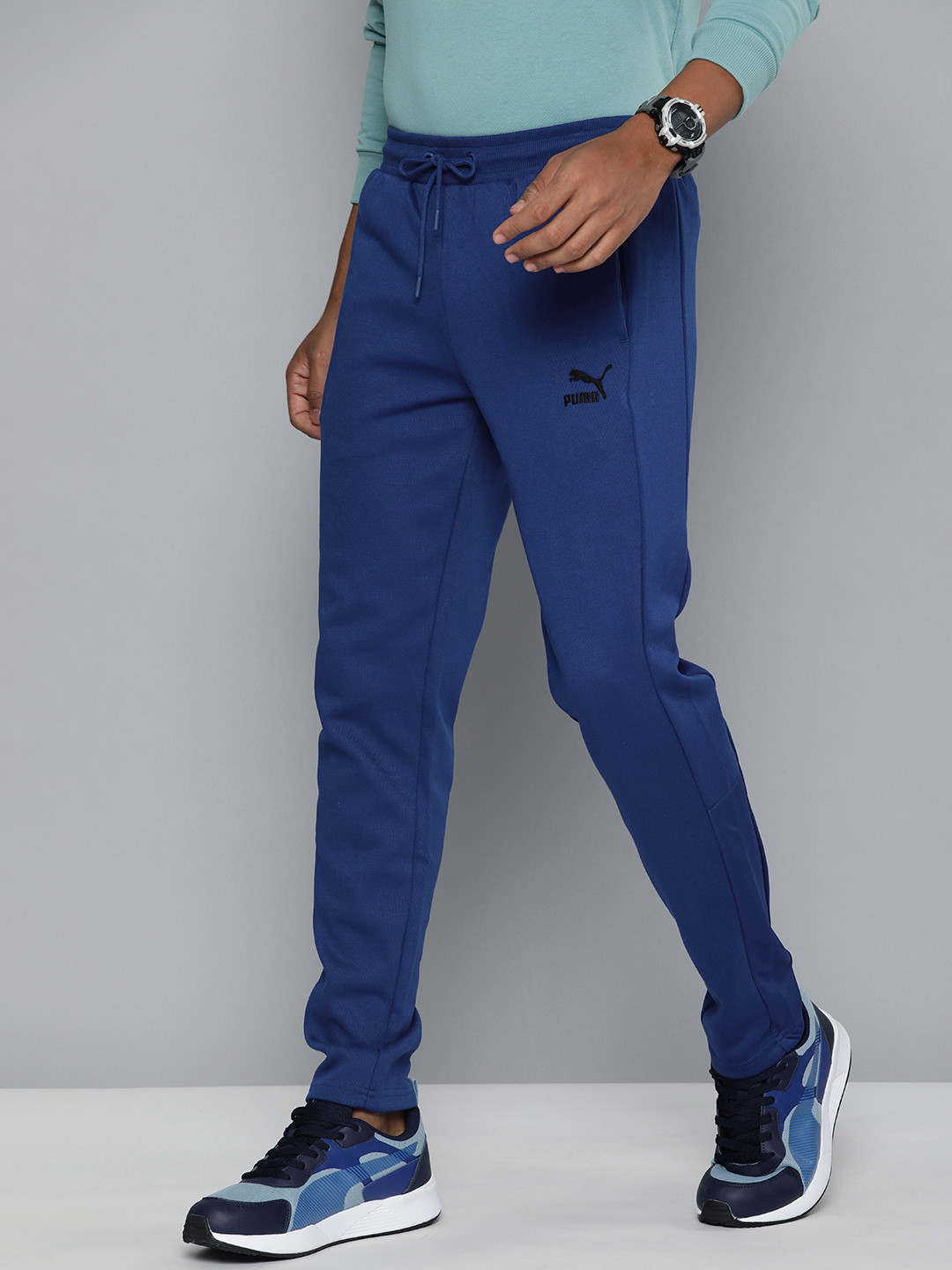Buy Puma Men Blue Slim Fit Overlay Track Pants With Printed Detail ...