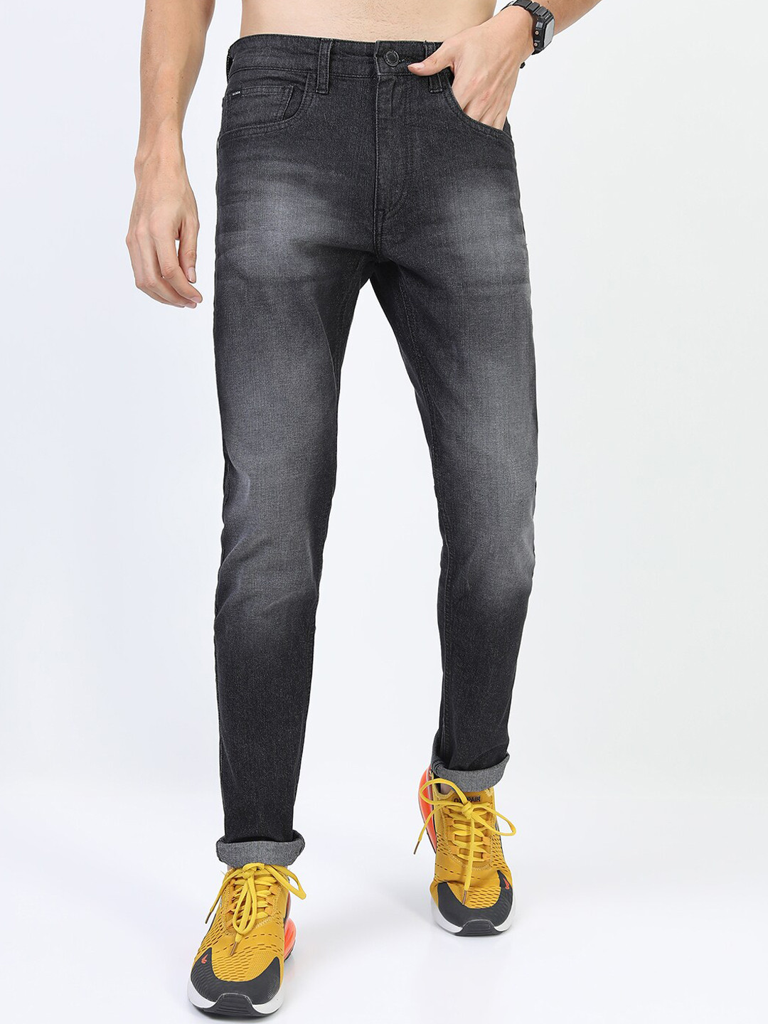 Buy HIGHLANDER Men Charcoal Tapered Fit Heavy Fade Stretchable Jeans ...