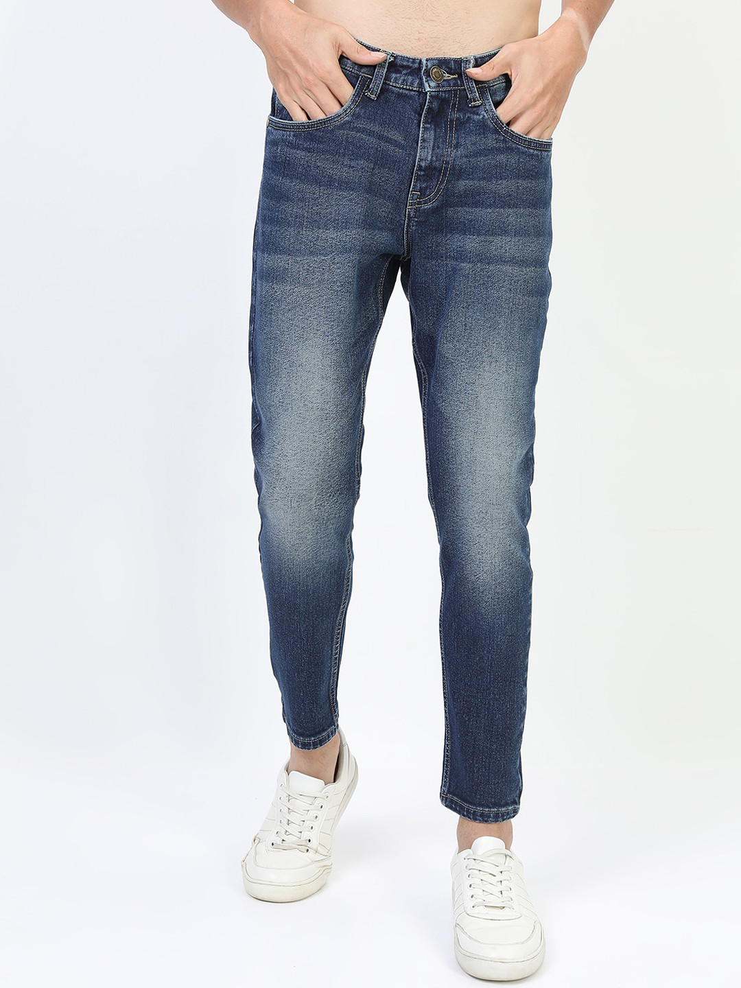 Buy HIGHLANDER Men Blue Tapered Fit Low Distress Light Fade Stretchable ...