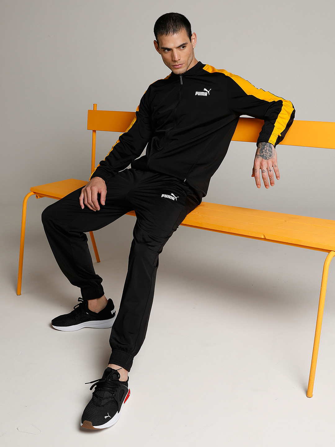 Buy Puma Men Black & Yellow Solid Baseball Tricot Regular Fit ...