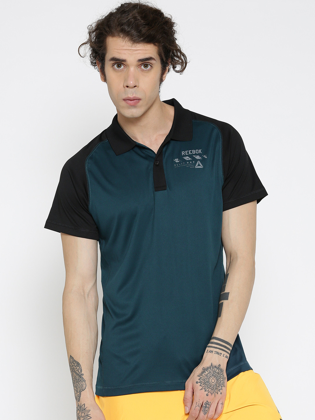 Buy Reebok Men Green ATHLTC POLY Solid Polo T Shirt - Tshirts for Men ...