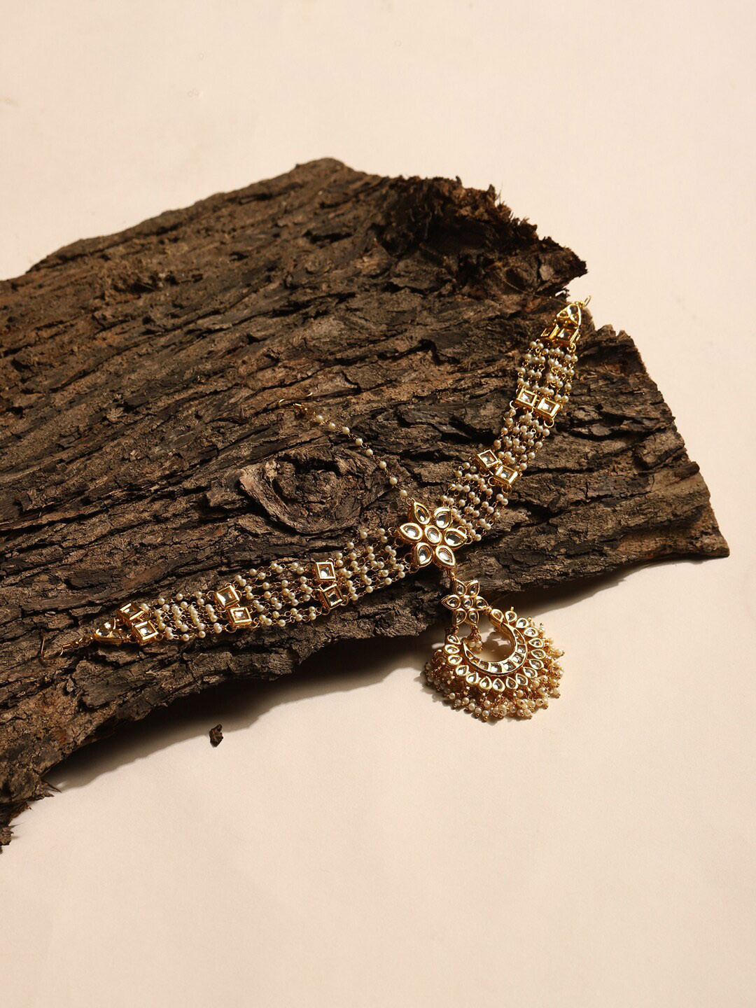 Buy Ruby Raang Gold Plated White Kundan Studded & Pearl Beaded Matha ...