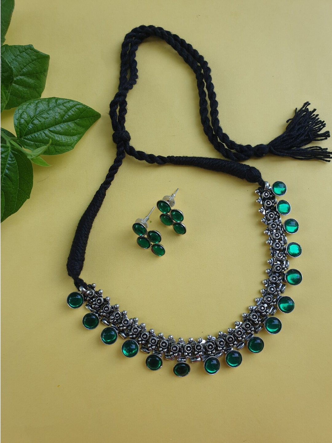 Buy FIROZA Woman Silver Toned Green Stone Studded Jewellery Set ...