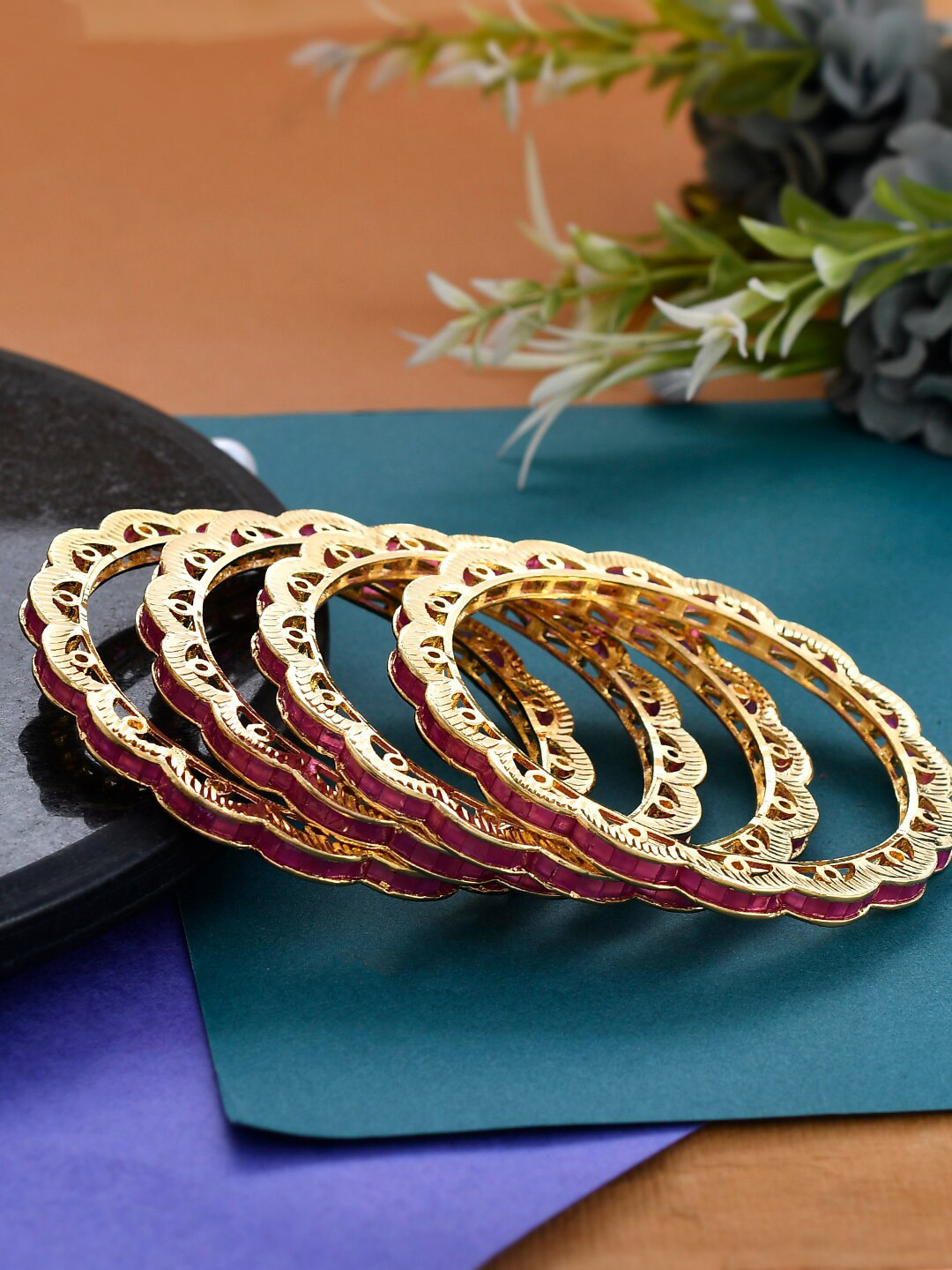 Buy Silvermerc Designs Set Of 4 Gold Plated AD Studded Bangles - Bangle ...
