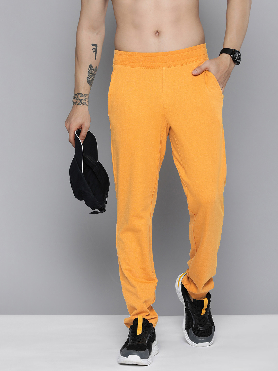 Buy HERE&NOW Men Mustard Yellow Solid Knitted Track Pants - Track Pants ...