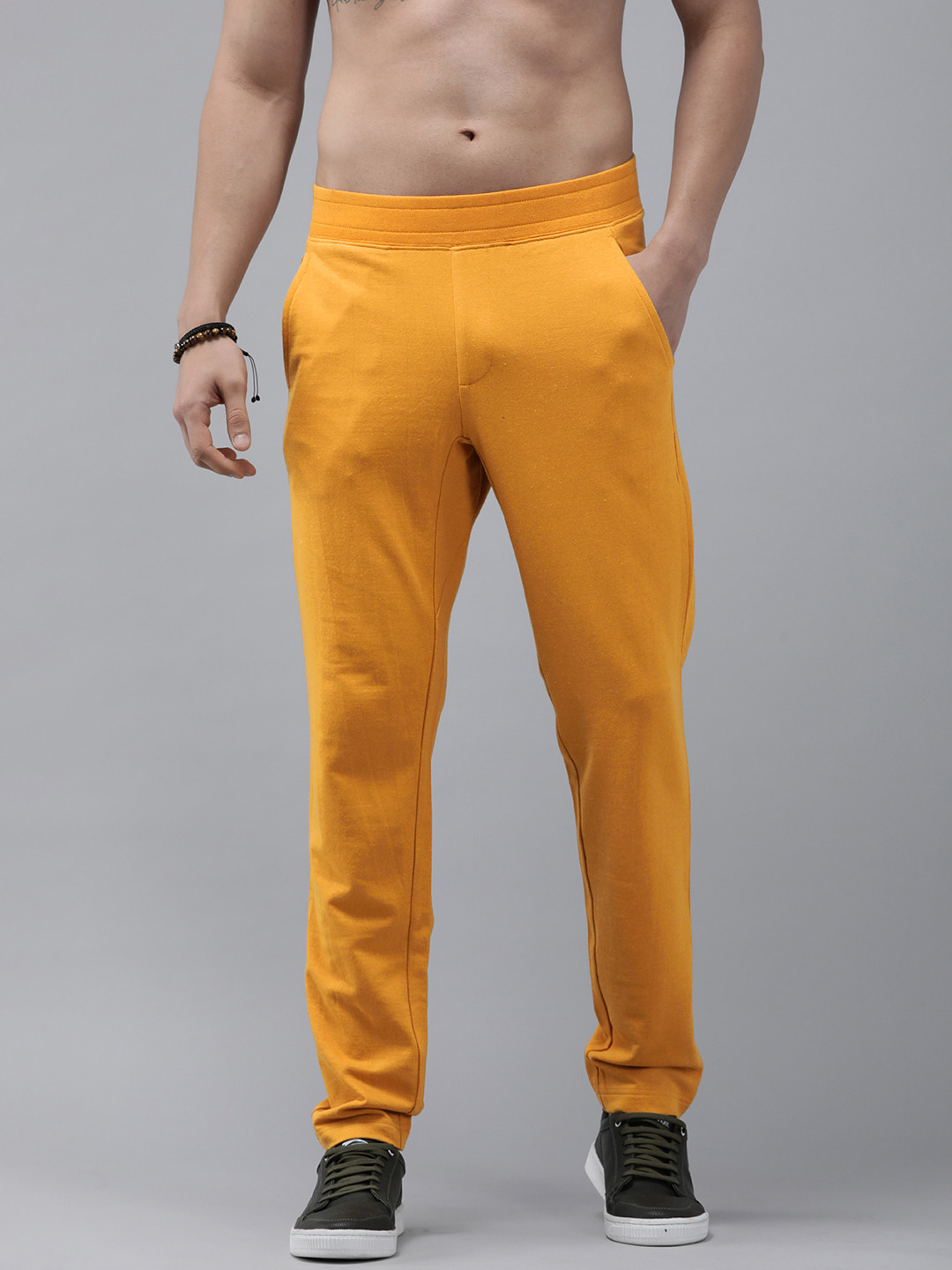 Buy Roadster Men Mustard Yellow Solid Track Pants - Track Pants for Men ...