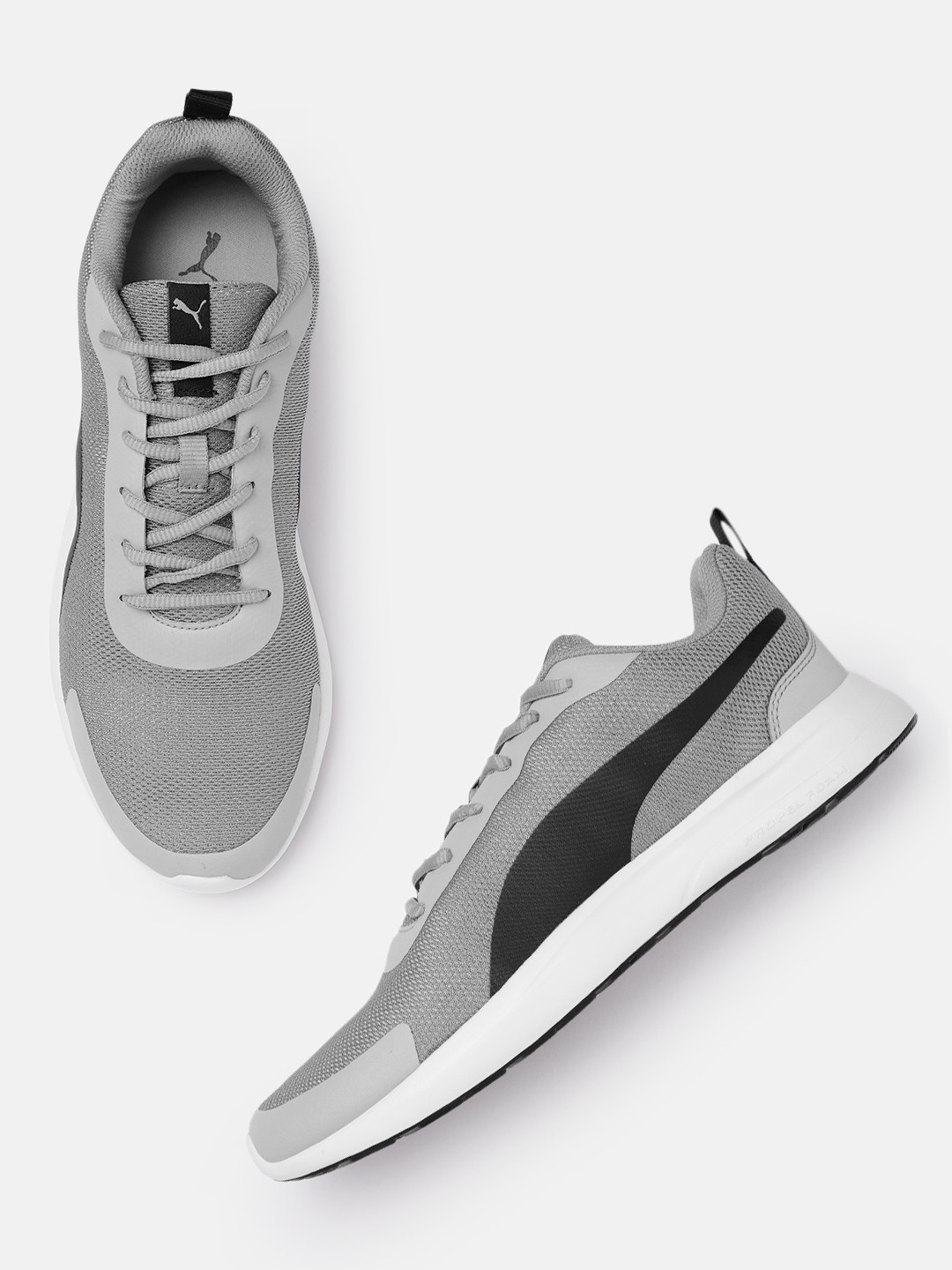 Buy Puma Men Grey Solid Sneakers - Casual Shoes for Men 20218068 | Myntra