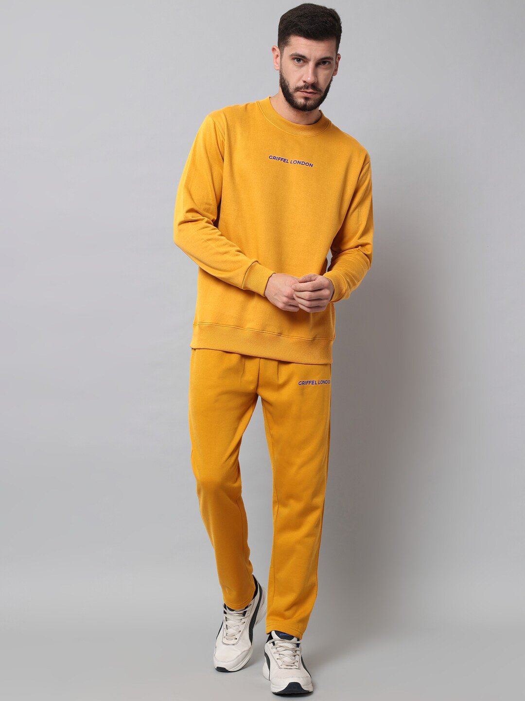 Buy GRIFFEL Men Mustard Solid Tracksuits - Tracksuits for Men 20236364 ...