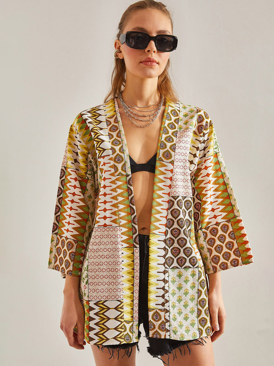 Buy BIANCO LUCCI Yeil Printed Open Front Shrug - Shrug for Women ...