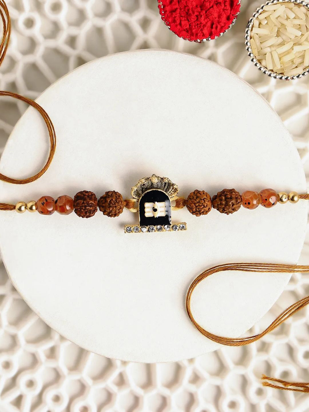 Buy Fnp Stone Studded & Beaded Shiva Charm Thread Rakhi With Roli ...