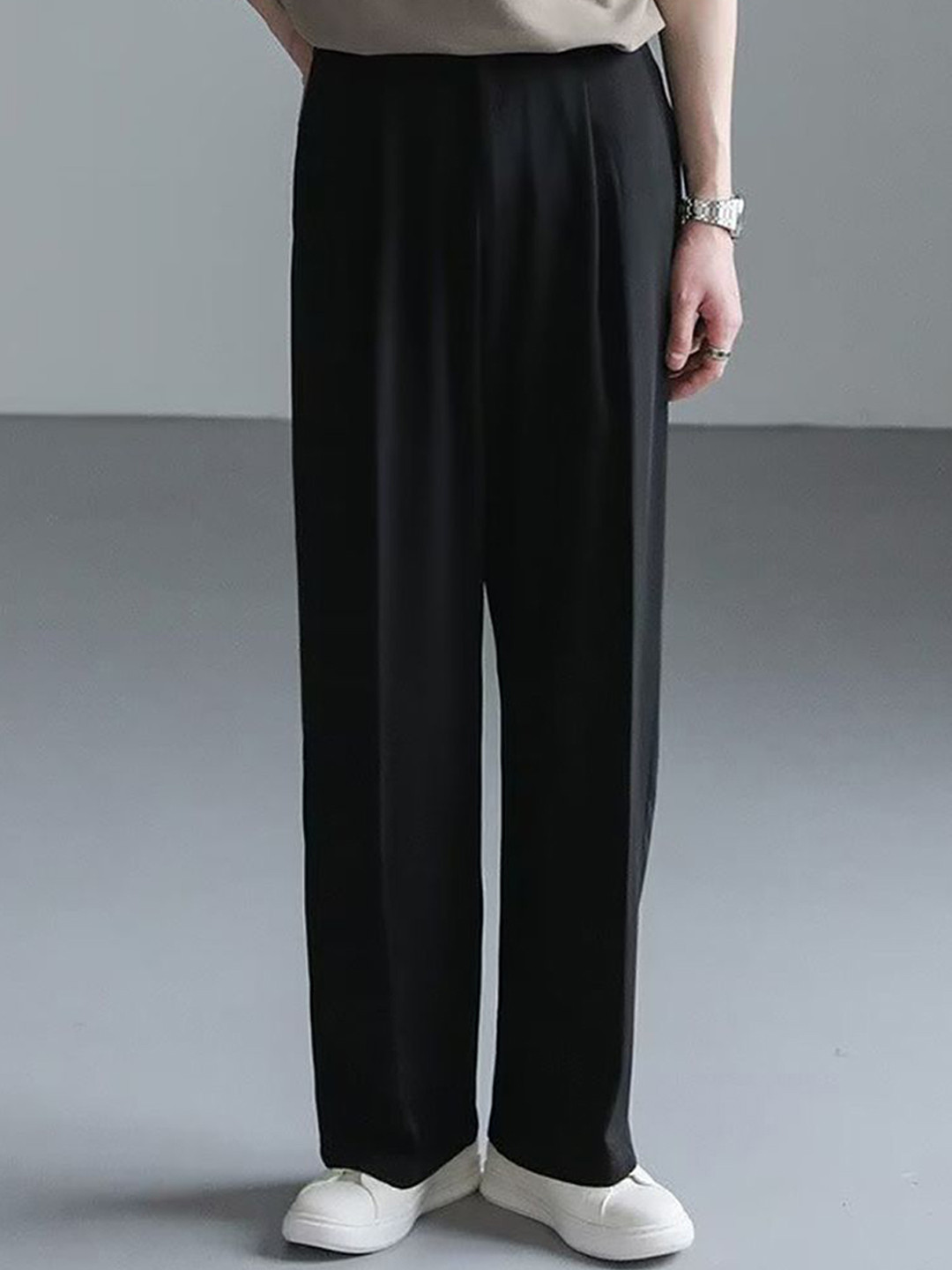 Buy StyleCast X Revolte Men Solid Loose Fit Pleated Parallel Trouser ...