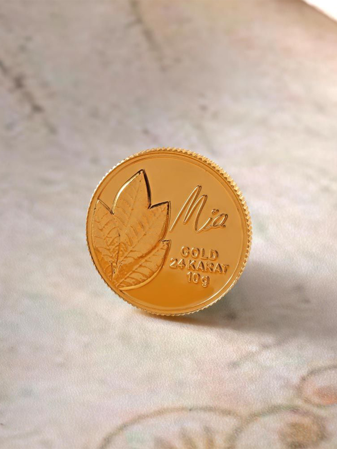 Buy Mia By Tanishq 10 Gm 24 Karat Mango Leaf Gold Coin - Gold Coin for ...