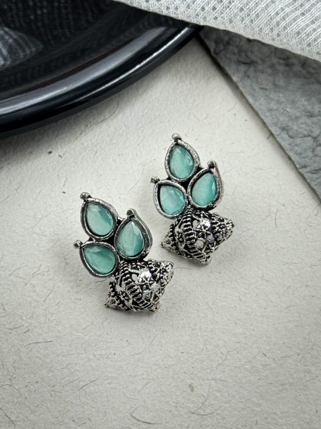 Buy NAMAN ARTS Silver Plated Artificial Stones Studded Floral Shaped ...
