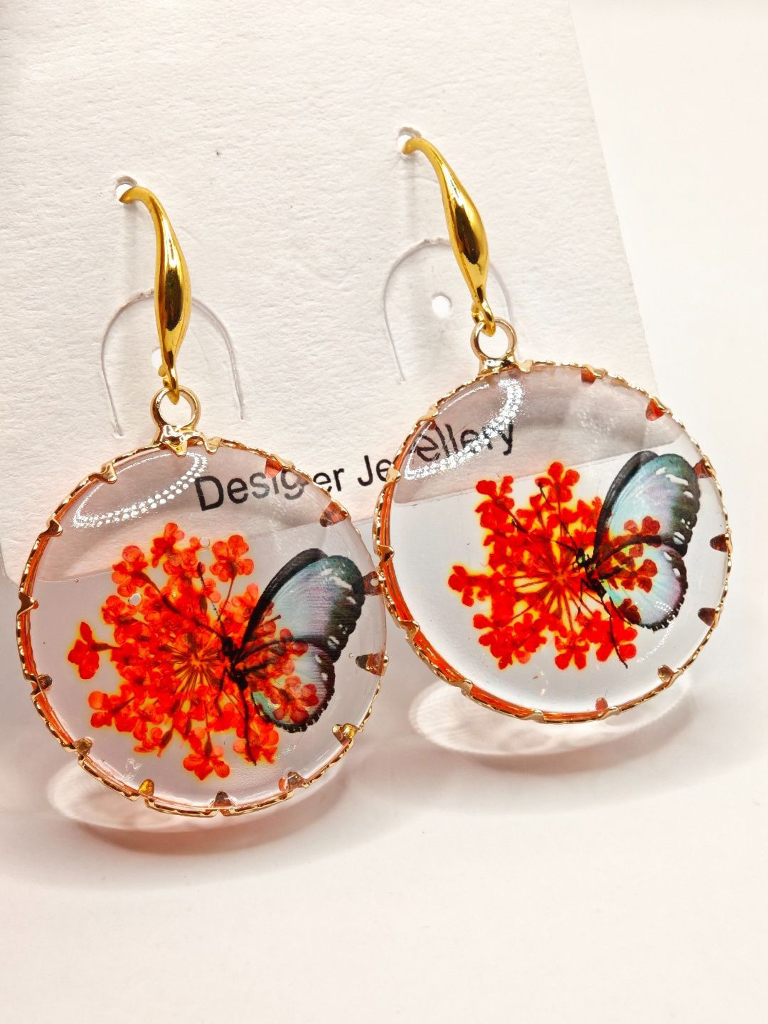 Buy SAPRAA TRENDS Gold Plated Resin Circular Shaped Drop Earrings ...