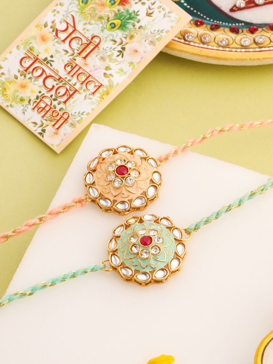 Buy Anouk Pack Of 2 Kundan Studded Bhaiya Bhabhi Rakhi With Roli Chawal ...