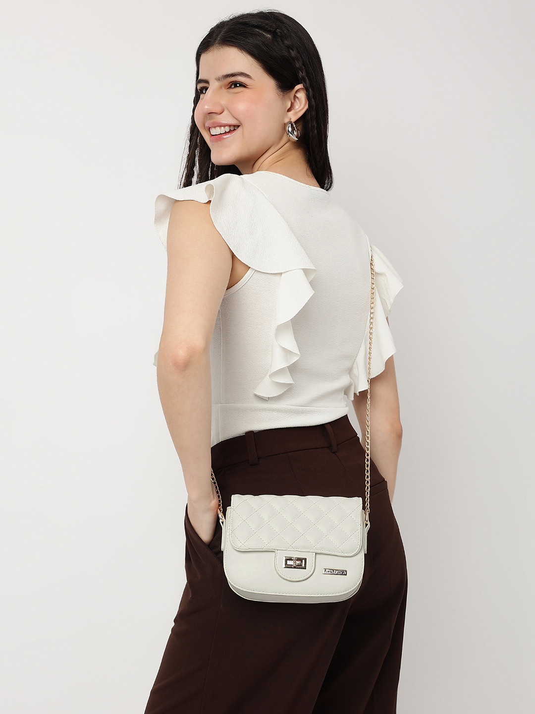 Buy Fastrack Women Solid Quilted Sling Bag With Flap And Twist Closure ...