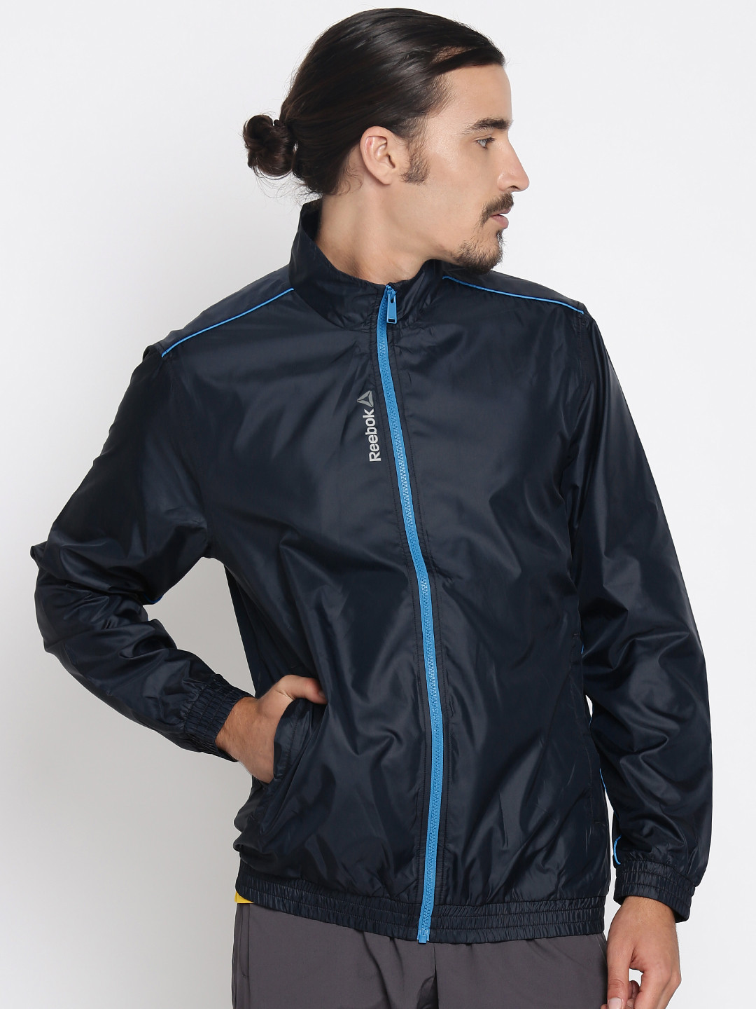 Buy Reebok Men Navy Blue Solid Windcheater Sporty Jacket - Jackets for ...