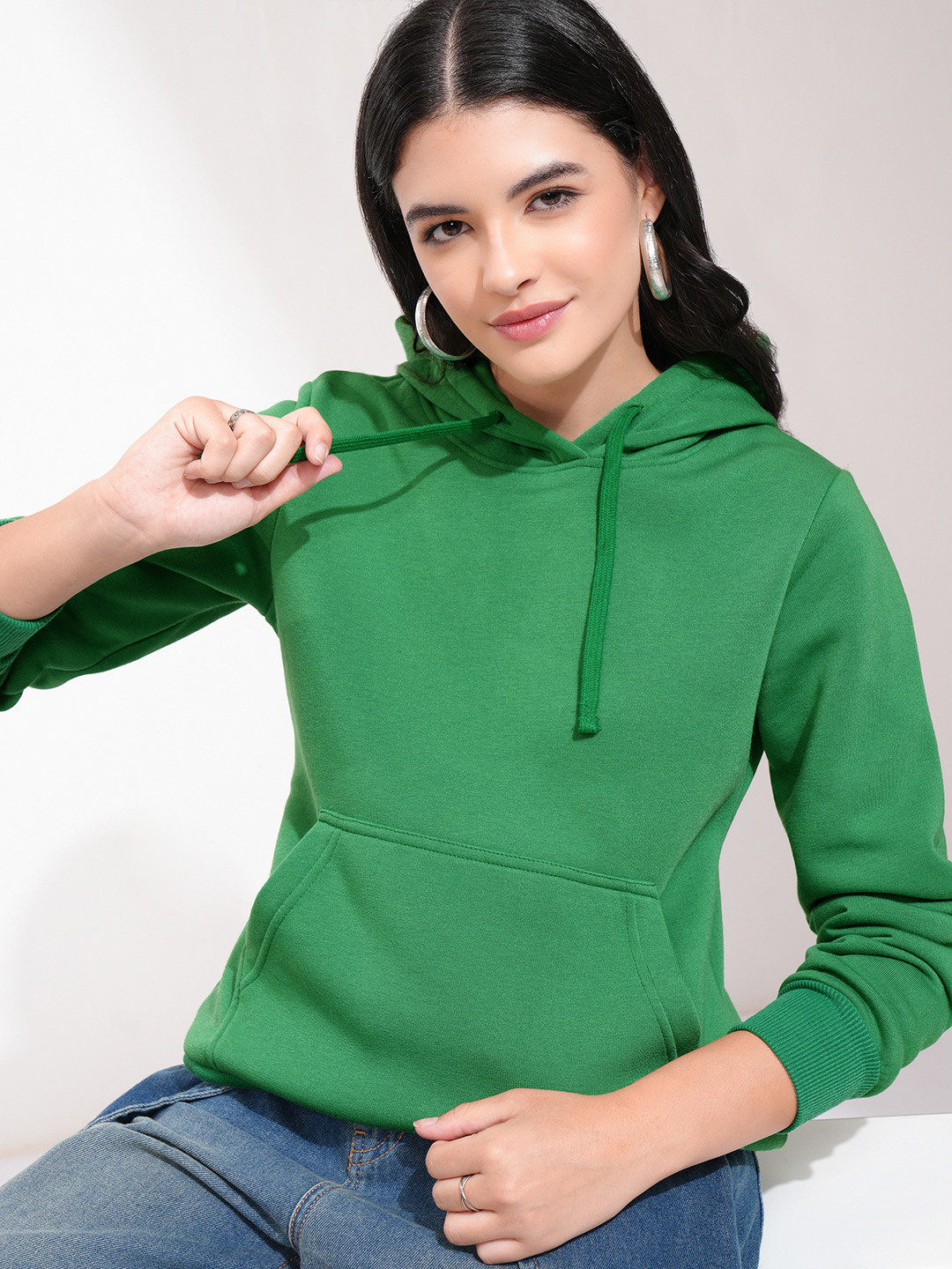 Buy Tokyo Talkies Women Green Solid Hooded Sweatshirt - Sweatshirts for ...