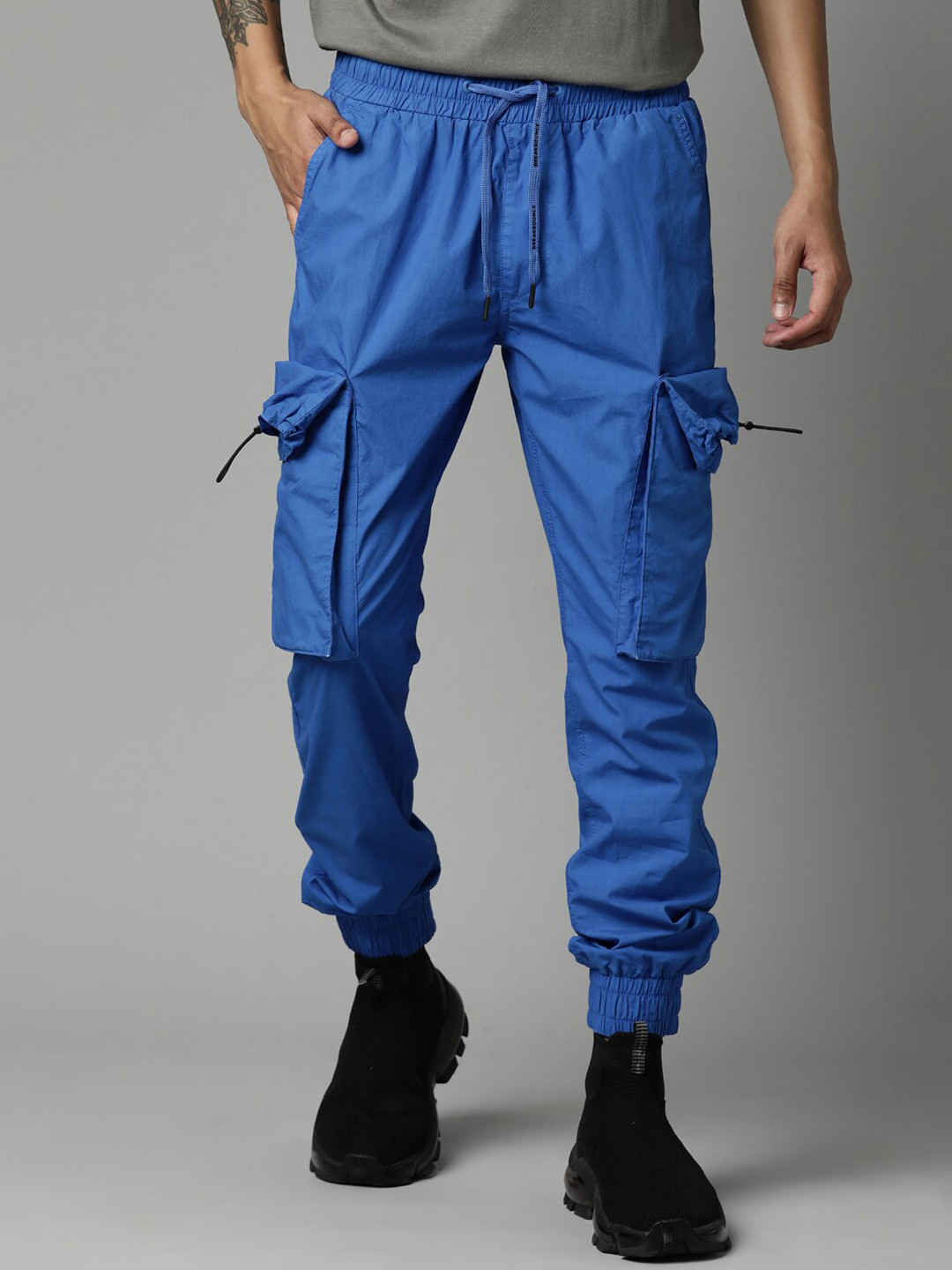 Buy Breakbounce Men Blue Solid Slim Fit Cotton Cargo Joggers - Trousers ...