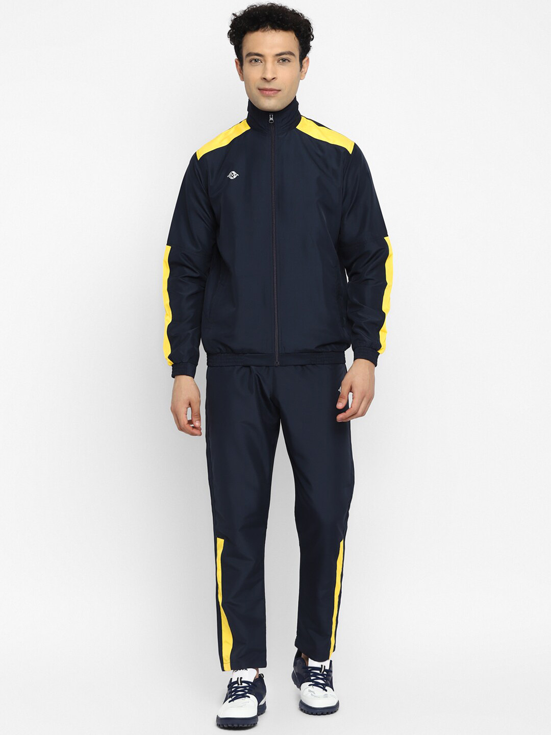 Buy NIVIA Men Navy Blue & Yellow Colourblocked Tracksuits - Tracksuits ...