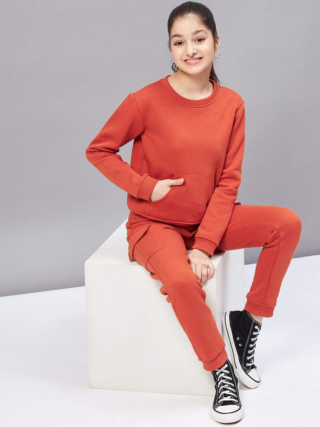 Buy Stylo Bug Girls Rust Solid Tracksuit - Tracksuits for Girls 20593216 | Myntra