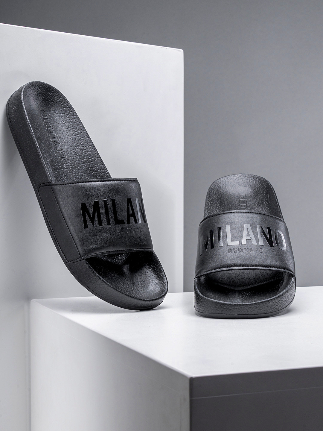 Buy Red Tape Men Black Solid Rubber Sliders - Flip Flops for Men ...