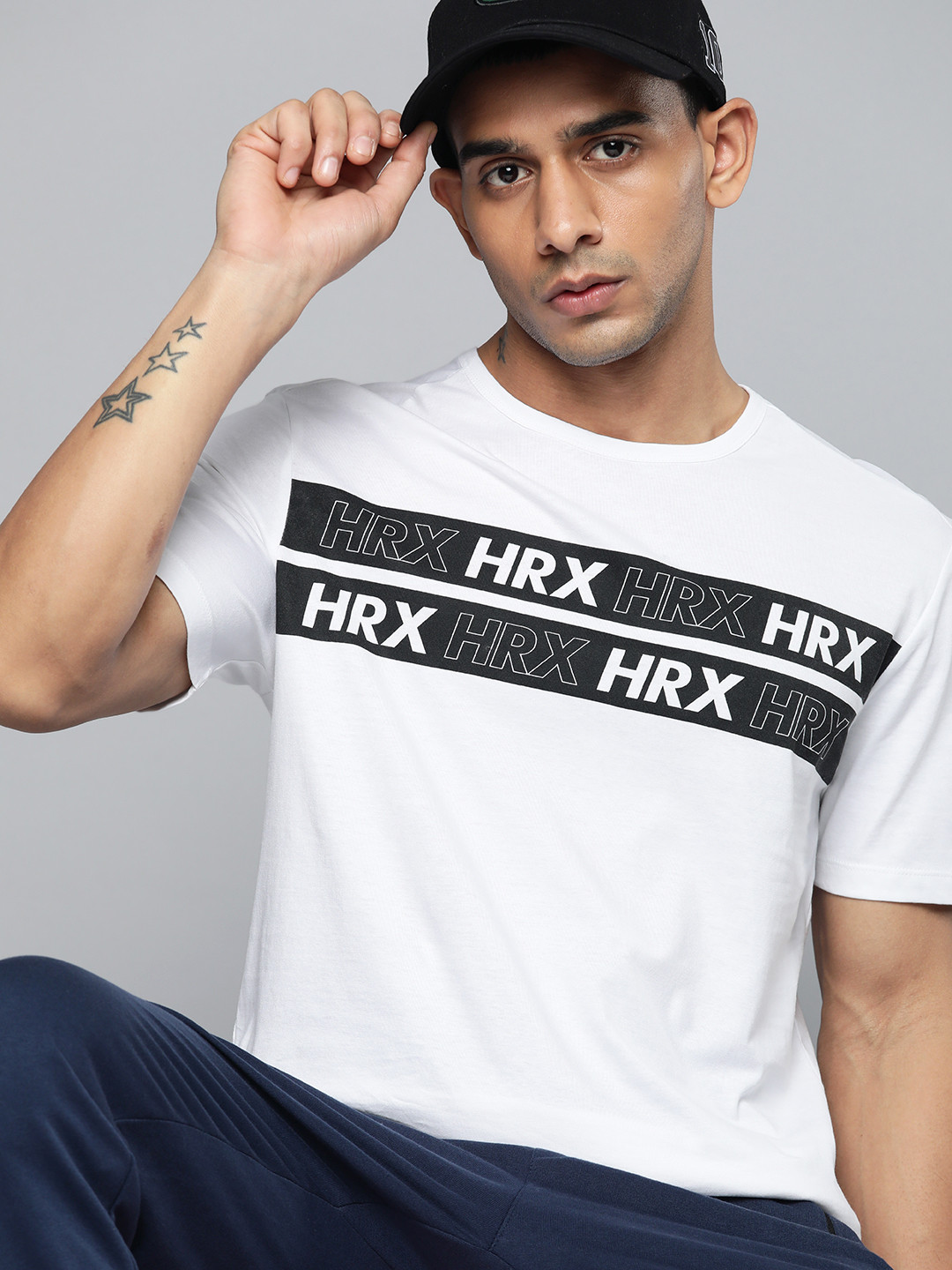 Buy HRX By Hrithik Roshan White & Black Brand Logo Printed T Shirt ...