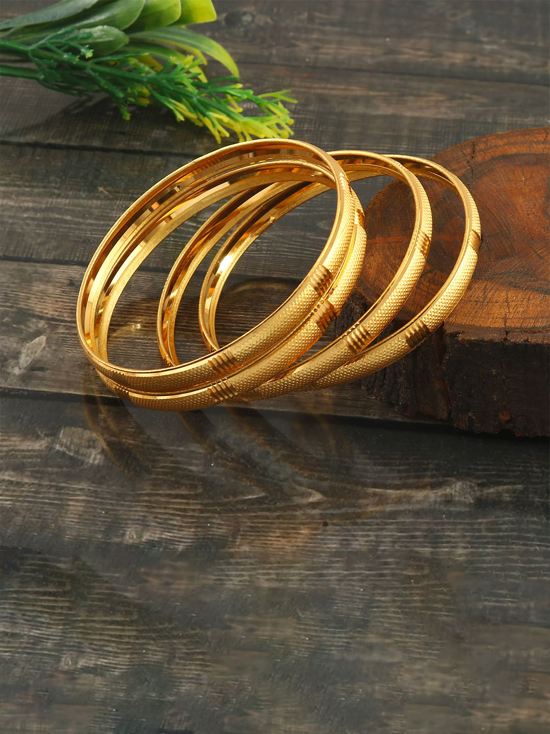 Buy Jewar Mandi Set Of 4 Gold Plated Cut Work Plane Design Bangles ...