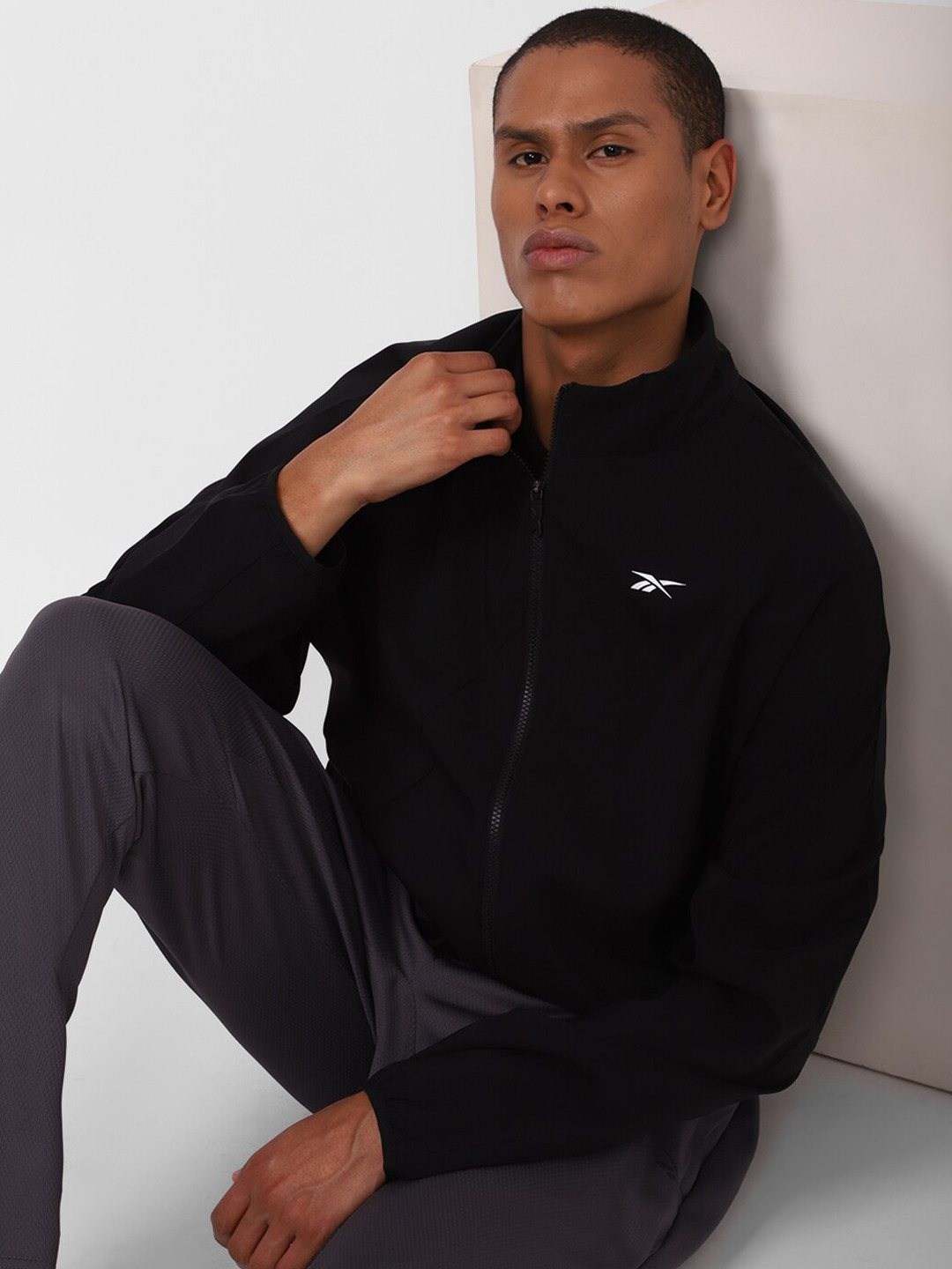 Buy Reebok Solid Sporty Jacket - Jackets for Men 21014700 | Myntra