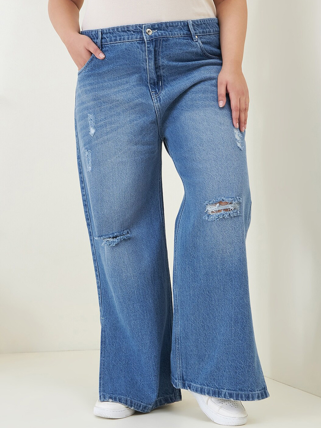 Buy CURVY STREET Women Flared Mildly Distressed Light Fade Jeans ...