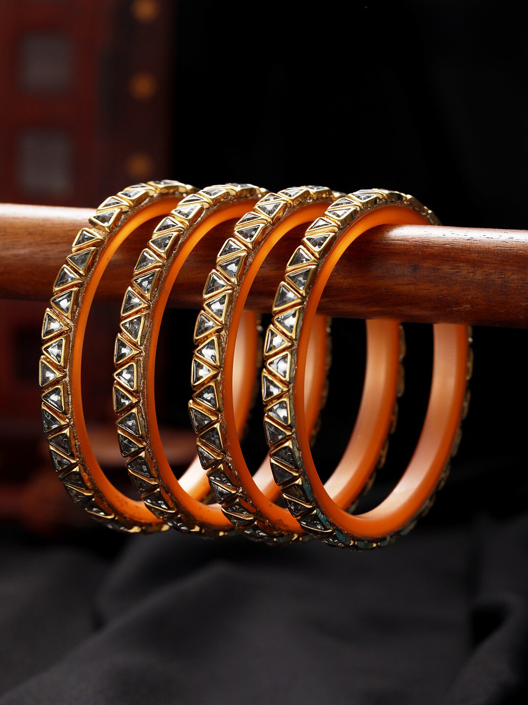 Buy Jazz And Sizzle Set Of 4 Gold Plated Kundan Studded Triangle Shaped ...