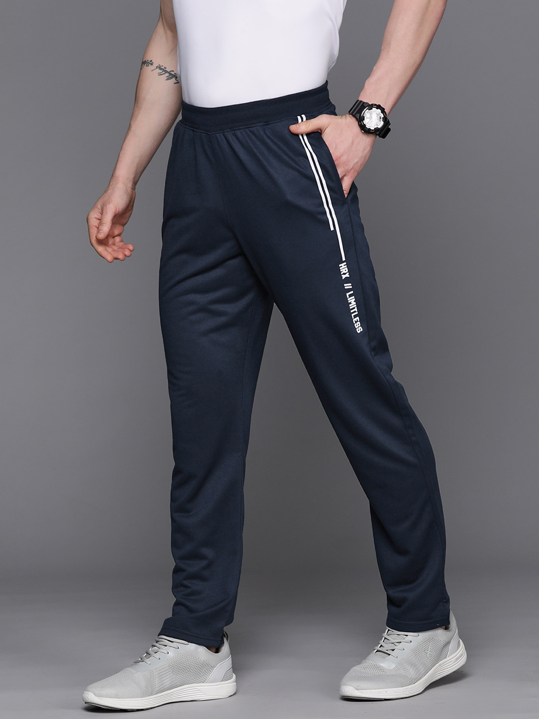 Buy HRX By Hrithik Roshan Men Printed Detail Lifestyle Track Pants ...