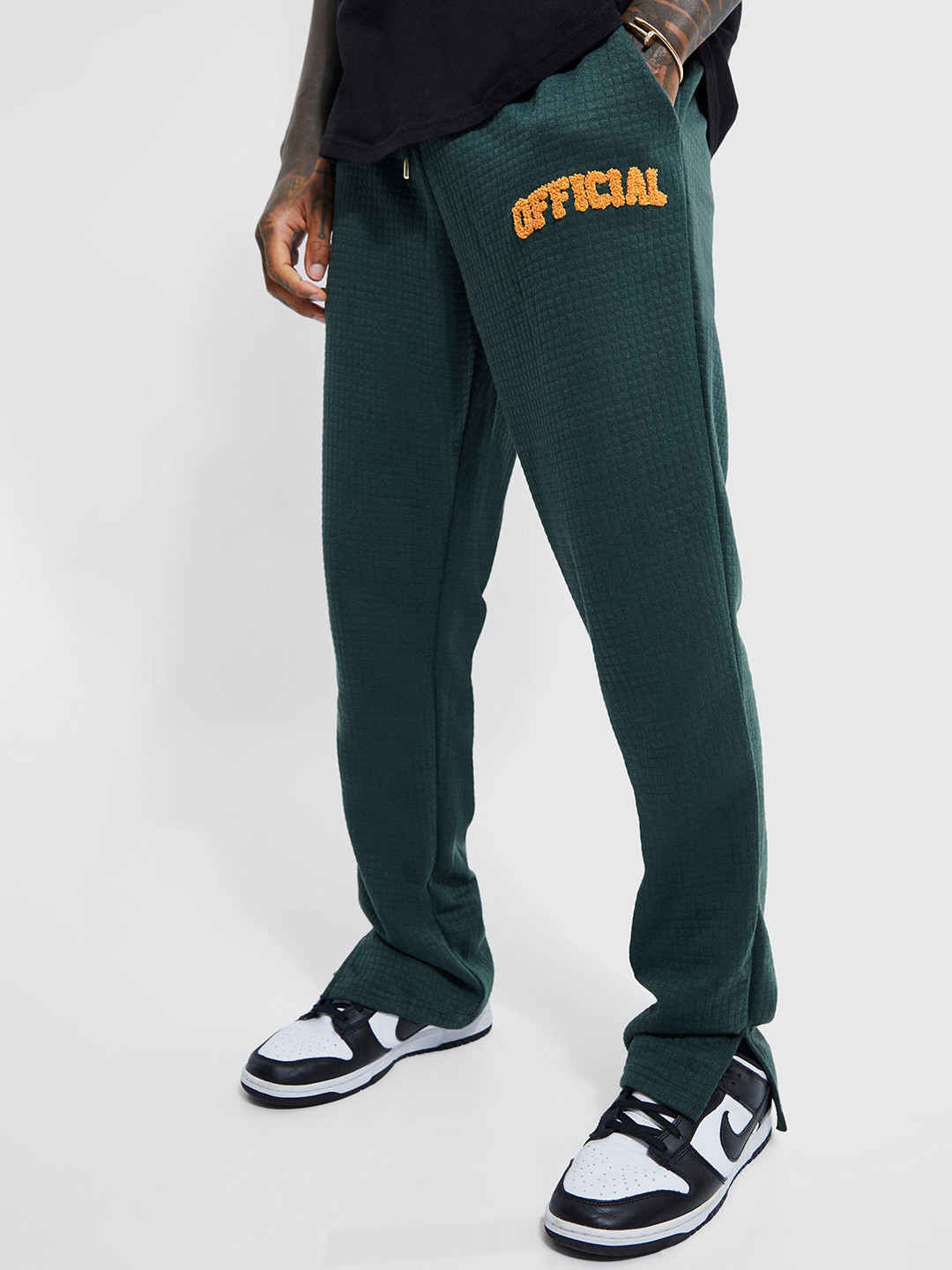 Buy BoohooMAN Textured Track Pants - Track Pants for Men 22167422 | Myntra