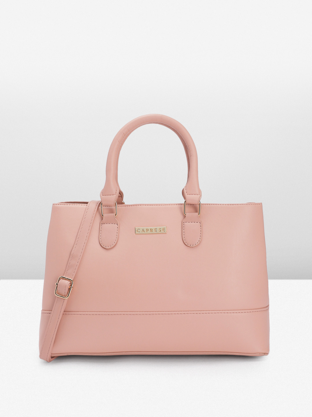 Buy Caprese Women Solid Handheld Bag - Handbags for Women 22381340 | Myntra