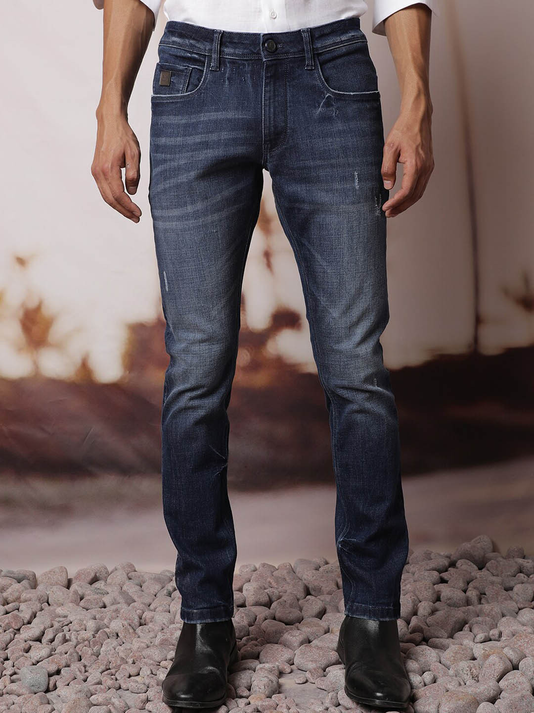 Buy RARE RABBIT Men Slim Fit Low Distressed Light Fade Cotton Jeans ...