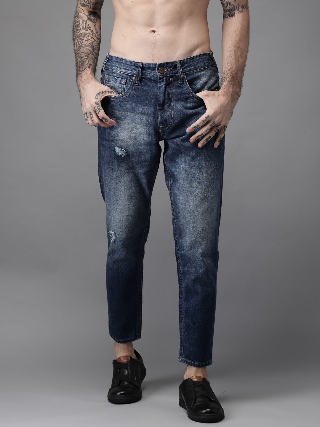Buy HERE&NOW Men Blue Tapered Fit Mid Rise Low Distress Jeans - Jeans ...