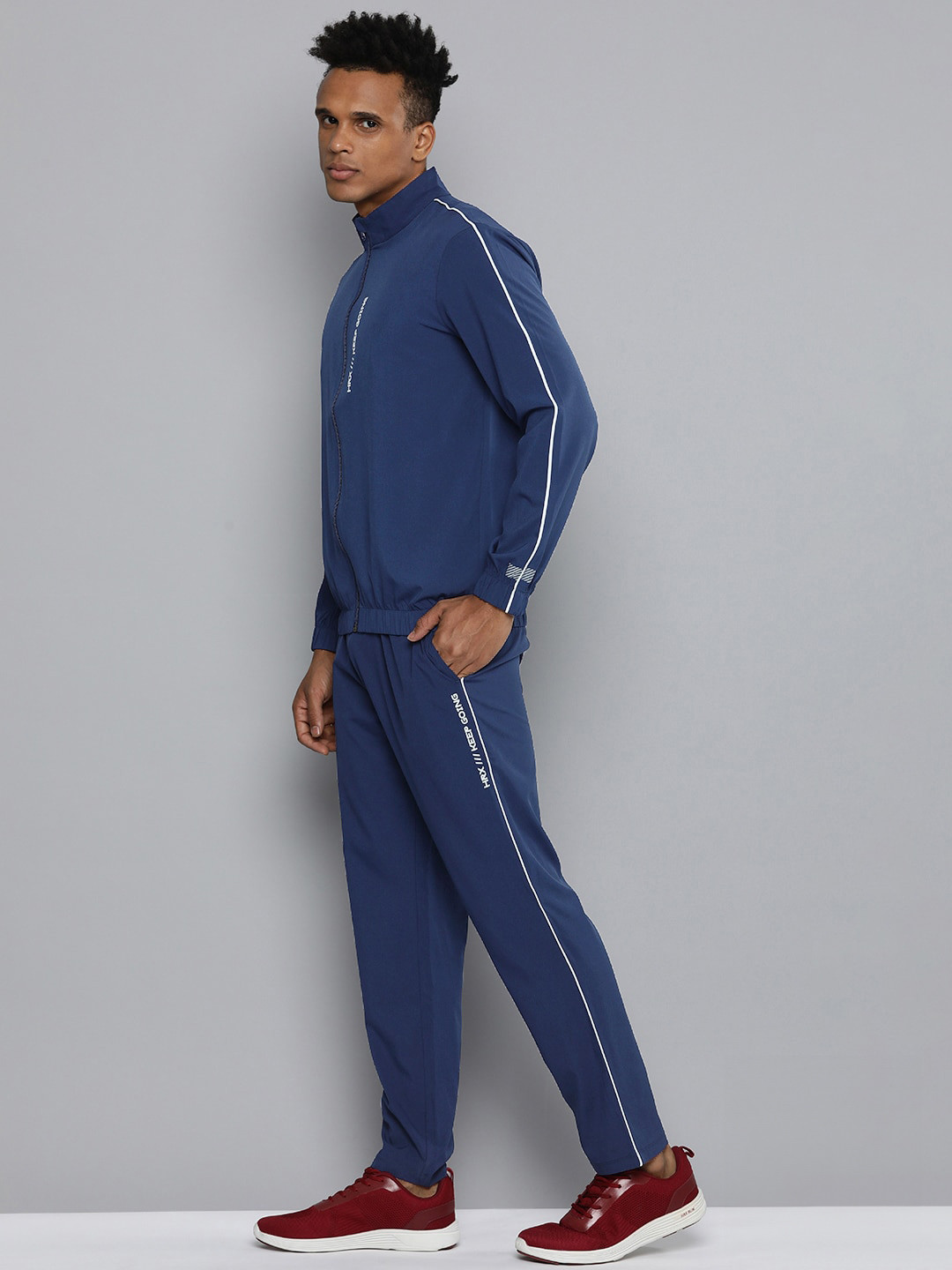 Buy HRX By Hrithik Roshan Men Regular Fit Rapid Dry Running Tracksuit ...