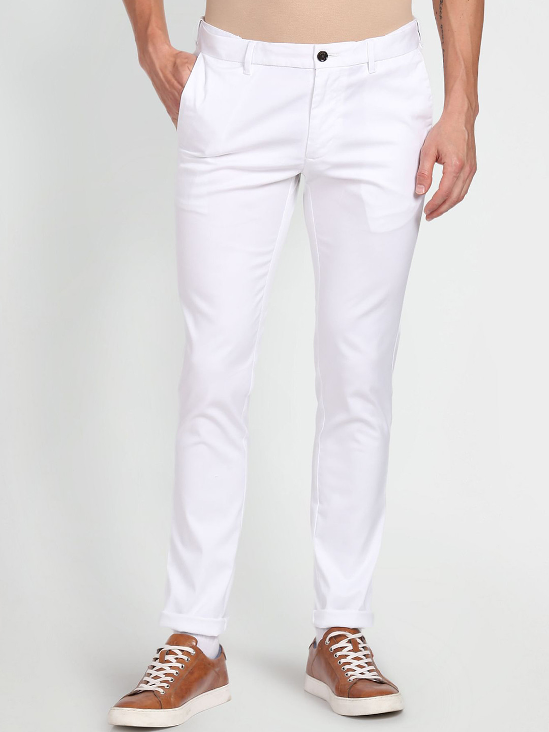 Buy Arrow Sport Men Mid Rise Low Rise Bronson Slim Fit Solid Cotton ...