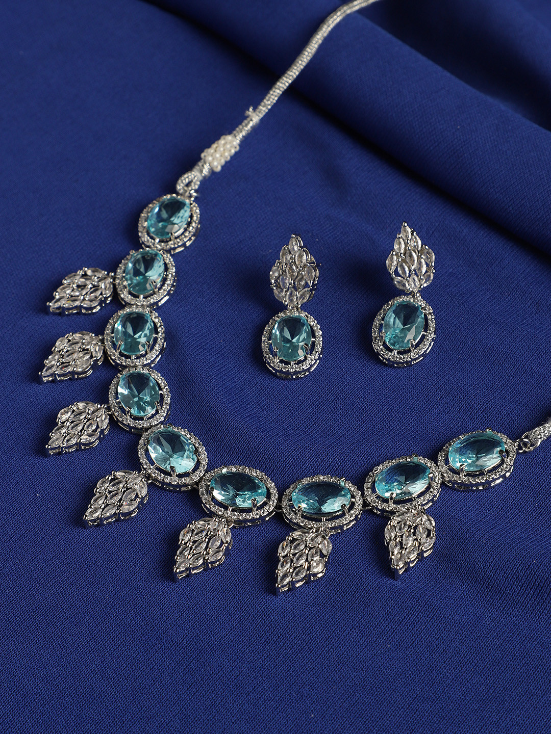 Buy Justpeachy Rhodium Plated AD Studded Jewellery Set - Jewellery Set ...